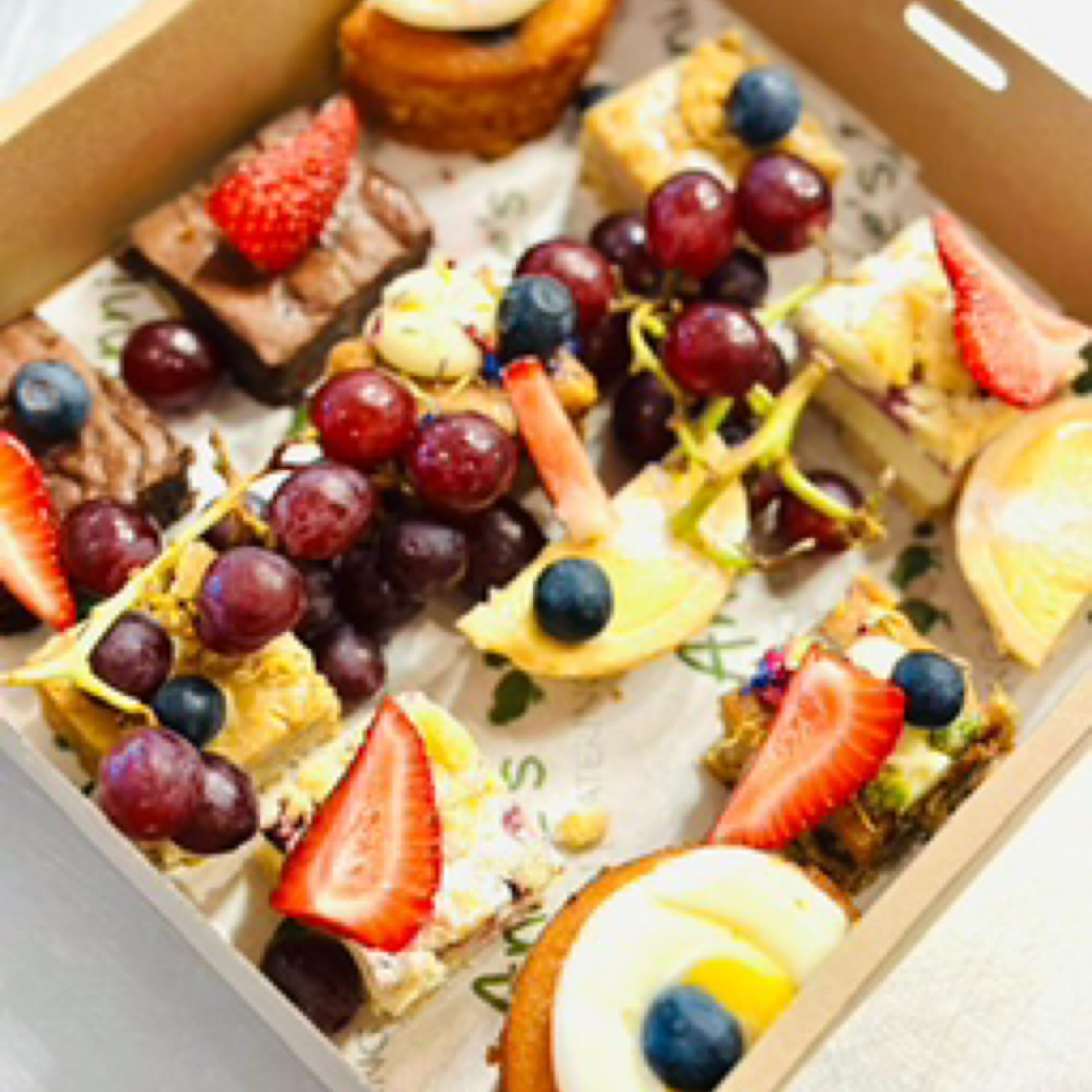 Annie's Sweet Box. A selection of mini sweet pieces & fresh fruit ...